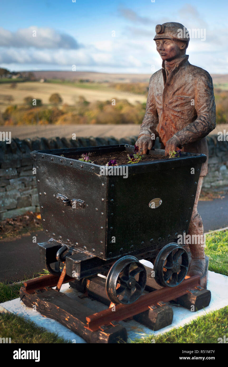 Restored lead mining tub and sculpture of miner, Rowley Bank ...
