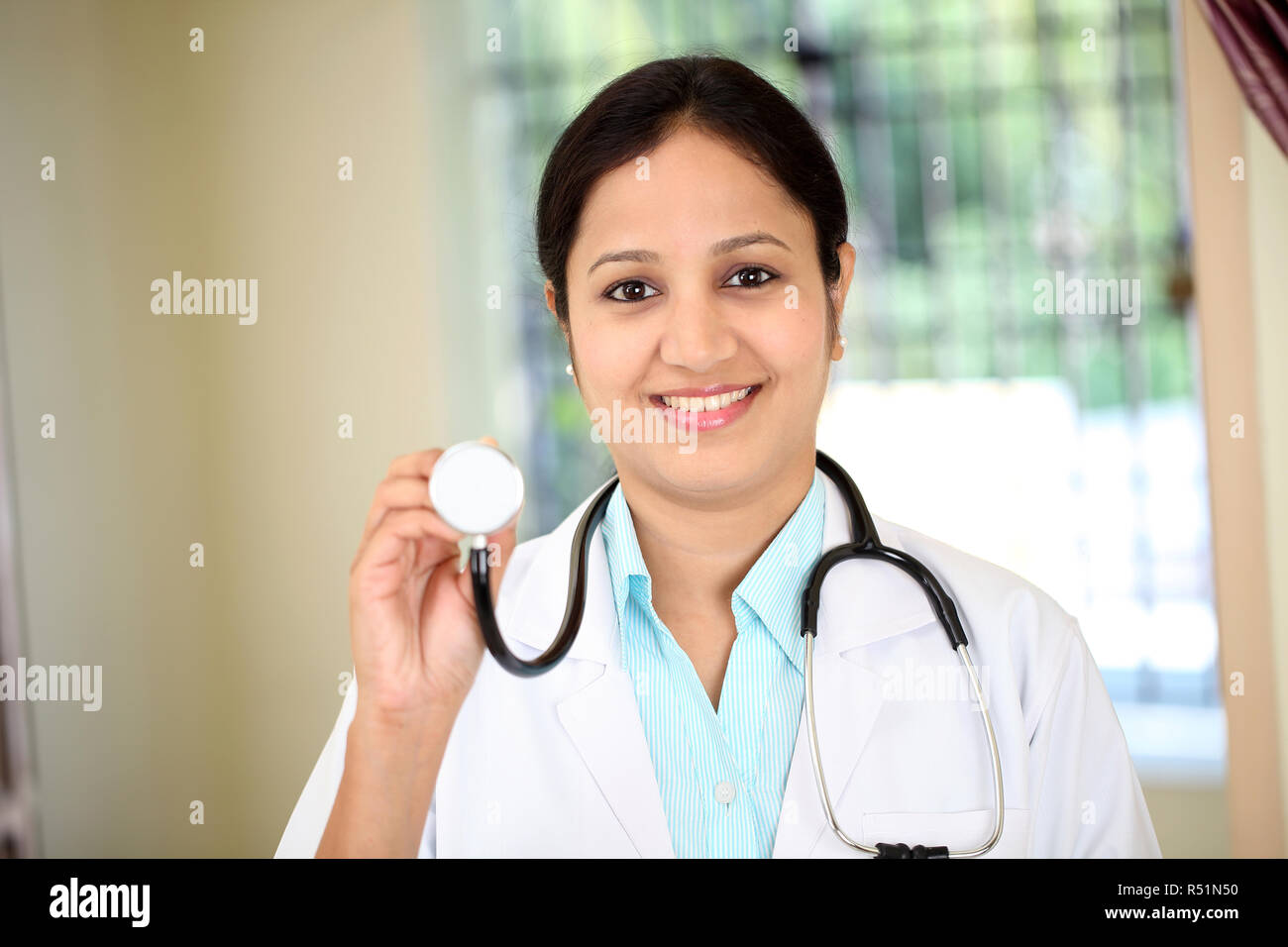Portrait of Indian female doctor Stock Photo - Alamy