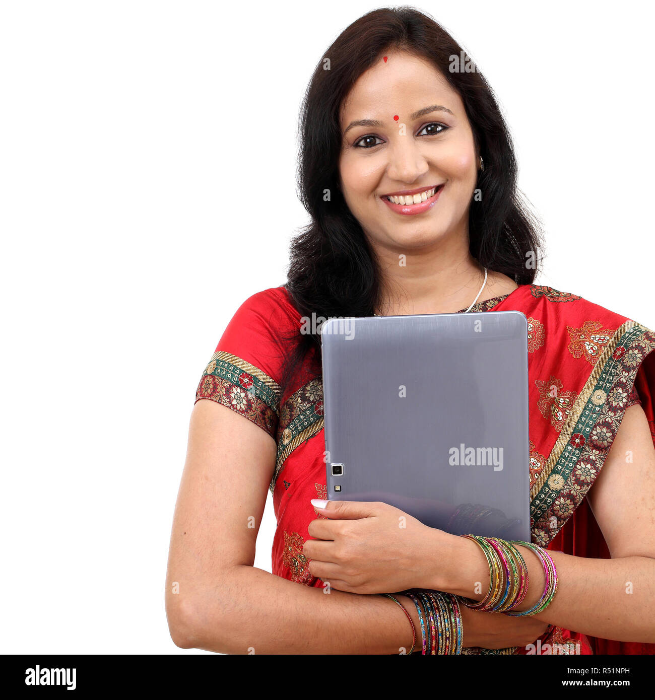 Traditional Indian woman with tablet computer Stock Photo - Alamy