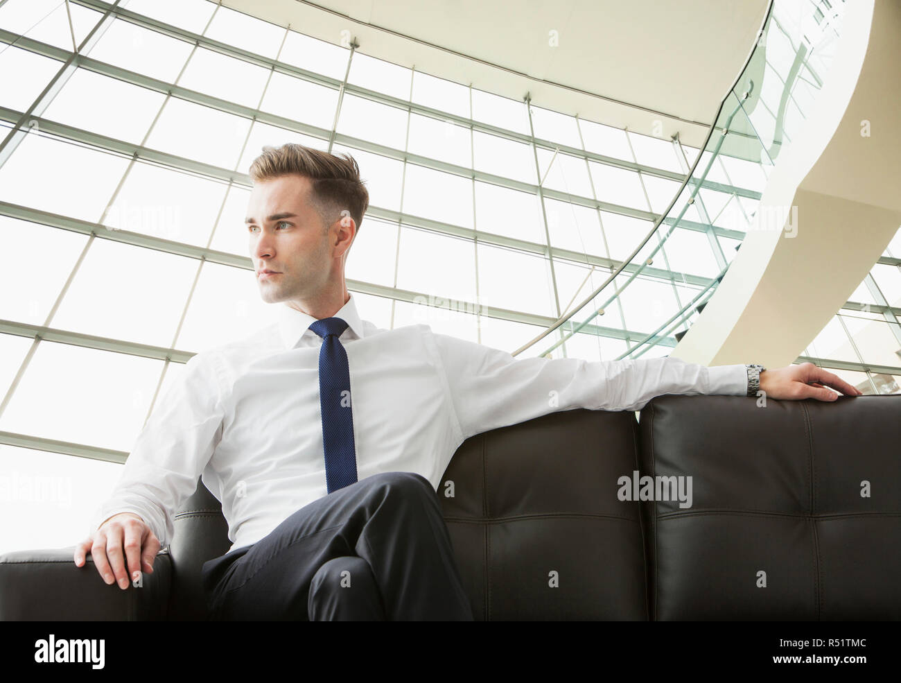 Man facing away suit hi-res stock photography and images - Alamy