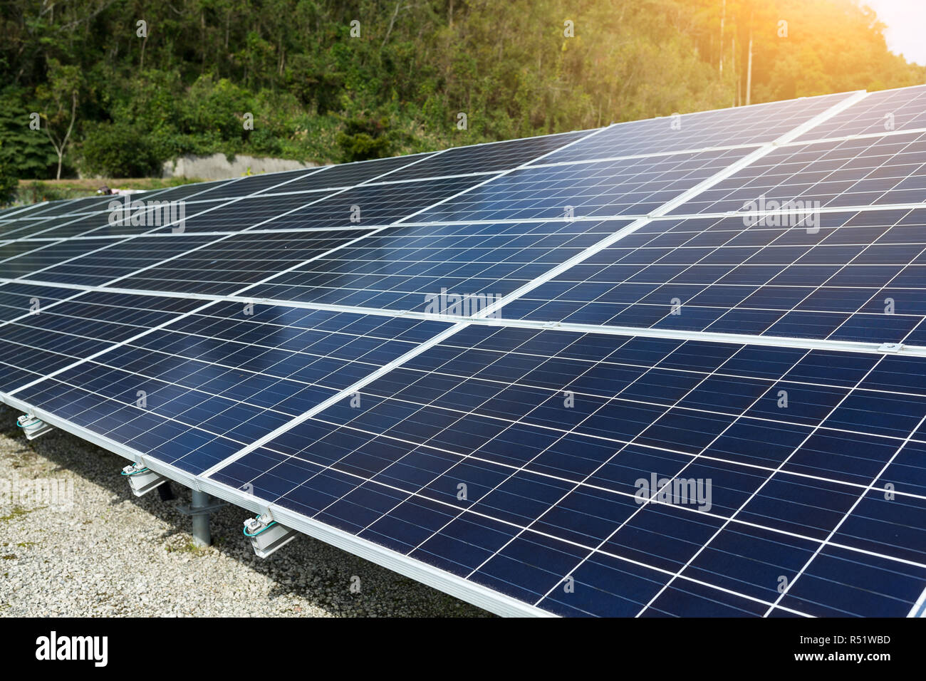 Solar panel with sun flare Stock Photo - Alamy