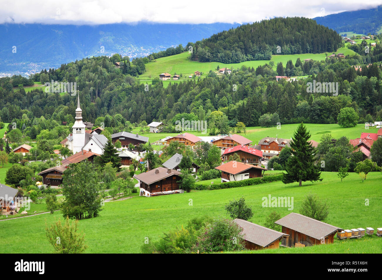 Amazing landscape with a church in Alps, Combloux town, France Stock ...