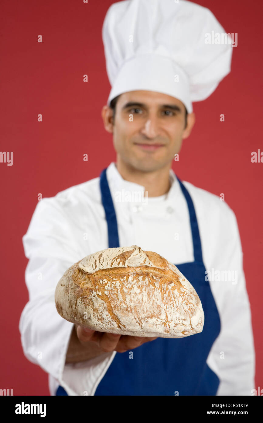 Laughing baker loaf bread hi-res stock photography and images - Alamy