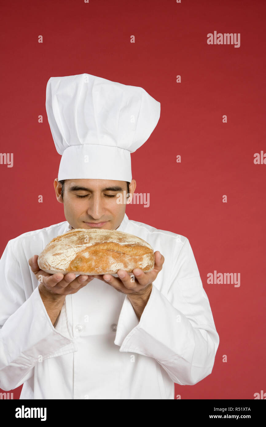 Laughing baker loaf bread hi-res stock photography and images - Alamy