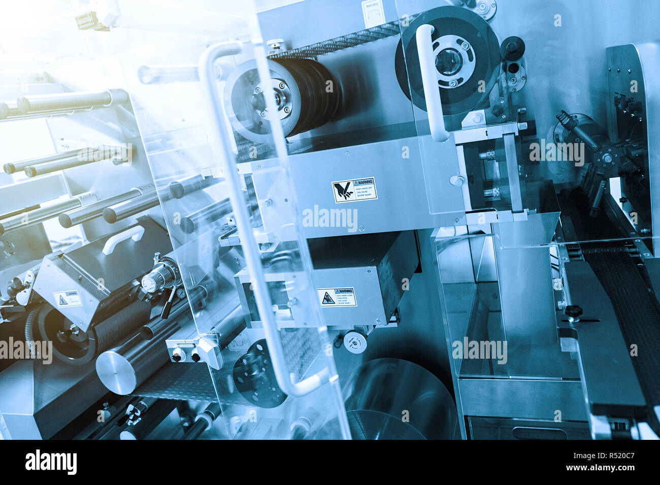 high-tech machines at the plant. Blue tone. Blue tint Stock Photo - Alamy