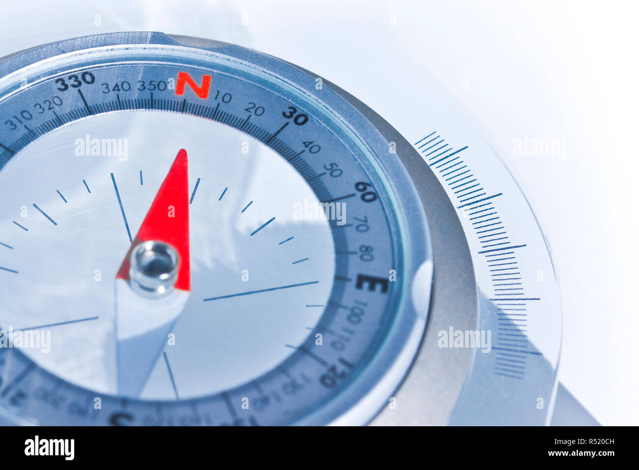 Follow your direction - concept image with compass on bright background ...