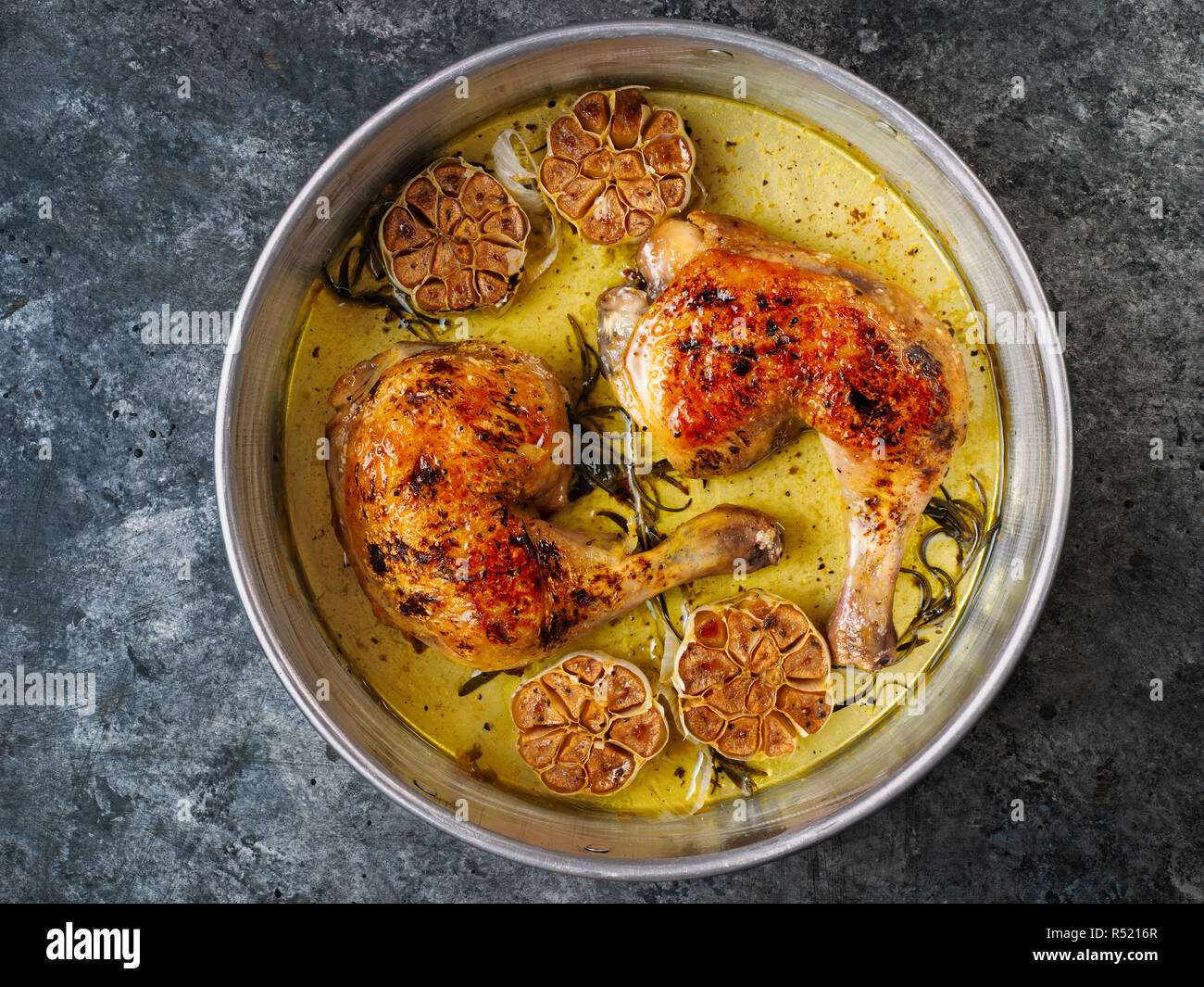 rustic italian roast chicken with garlic and rosemary Stock Photo - Alamy