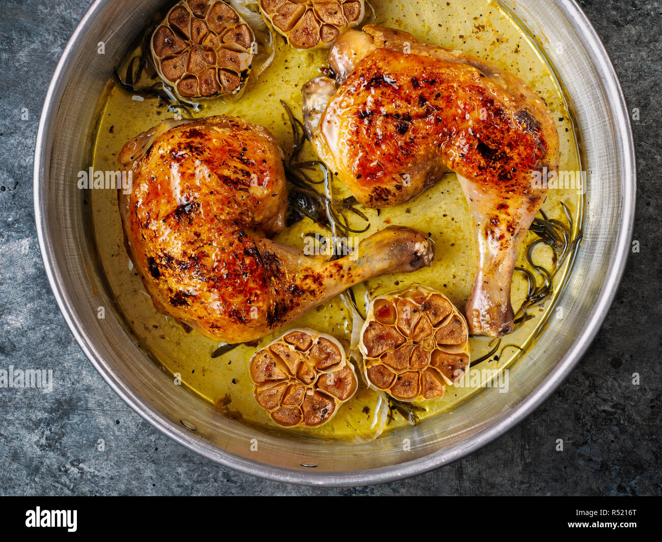 rustic italian roast chicken with garlic and rosemary Stock Photo - Alamy