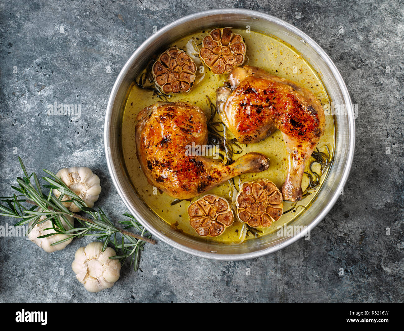 rustic italian roast chicken with garlic and rosemary Stock Photo - Alamy