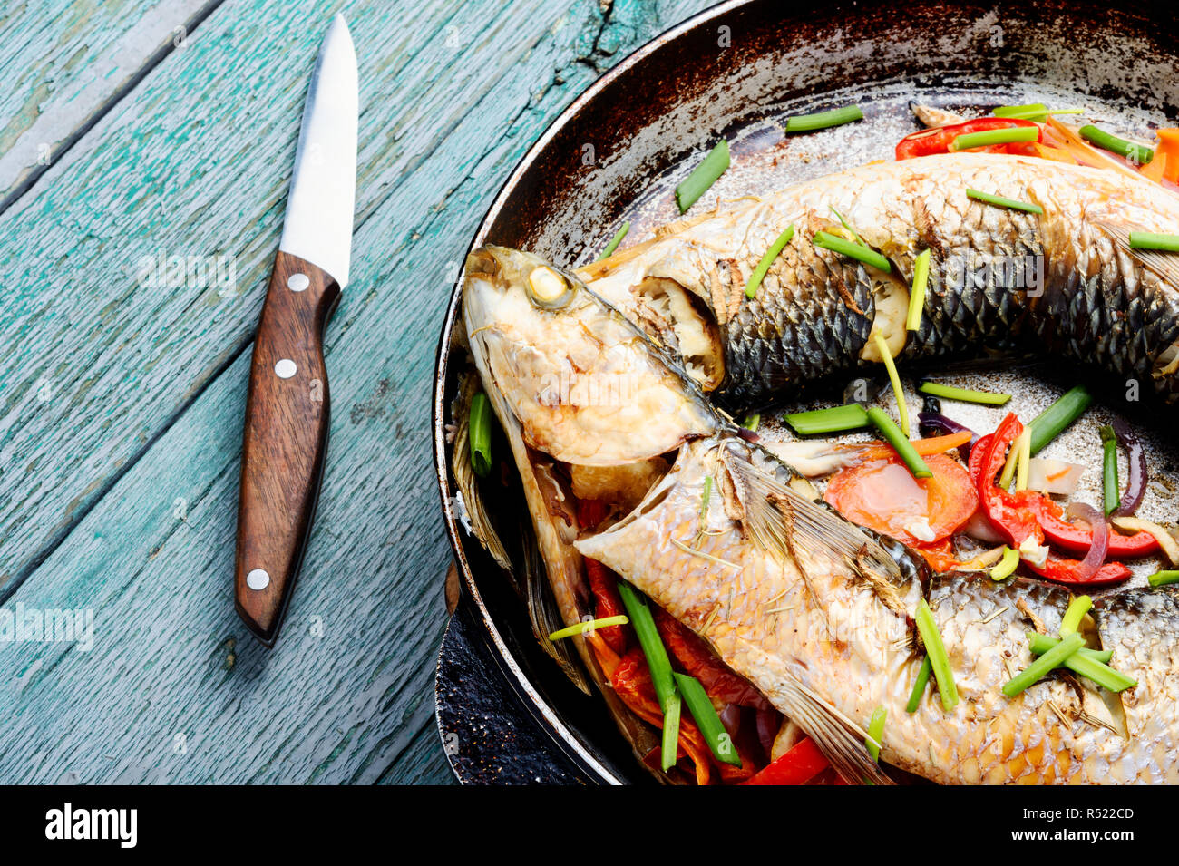 Baked sea fish stuffed with vegetables.Delicious roast freshwater fish ...