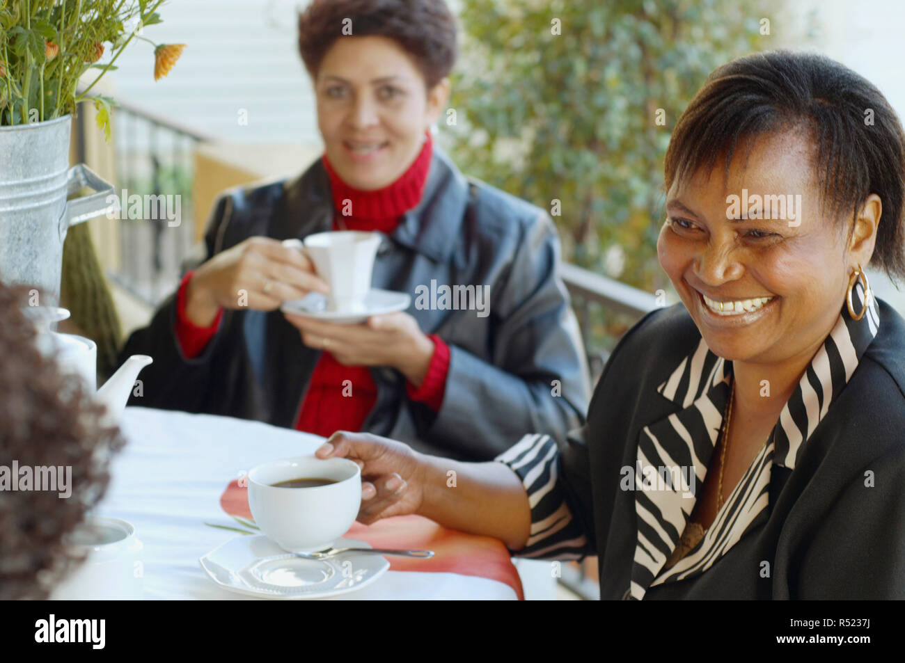 Two women feasting hi-res stock photography and images - Alamy