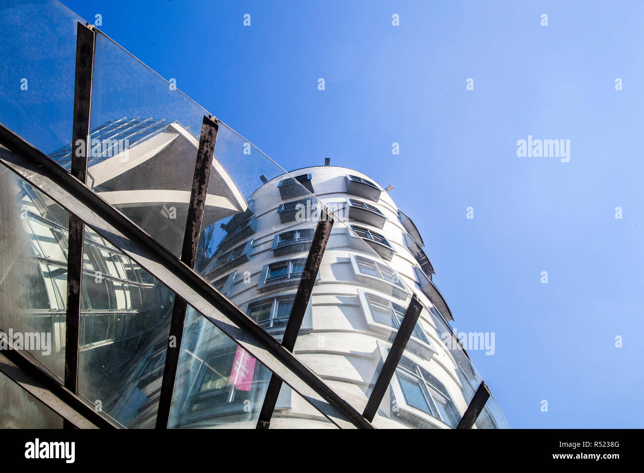 An upwards view to a facade of a famous Dancing house in Prague Stock ...