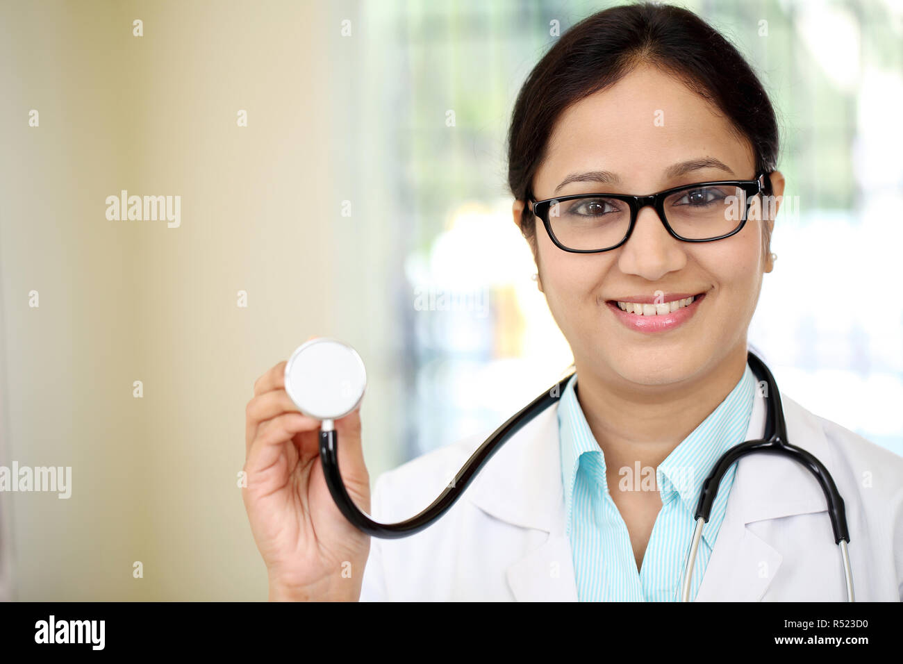 Portrait of Indian female doctor Stock Photo - Alamy