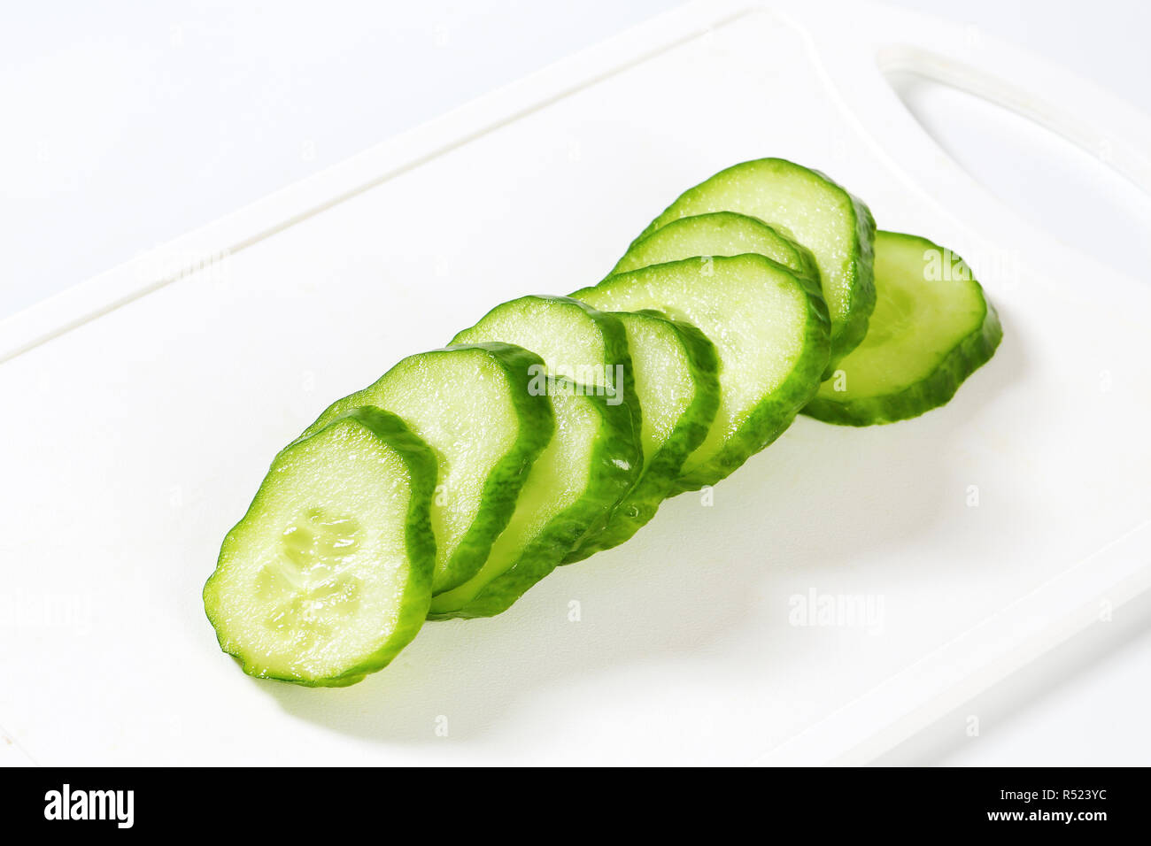 Sliced fresh cucumber Stock Photo - Alamy
