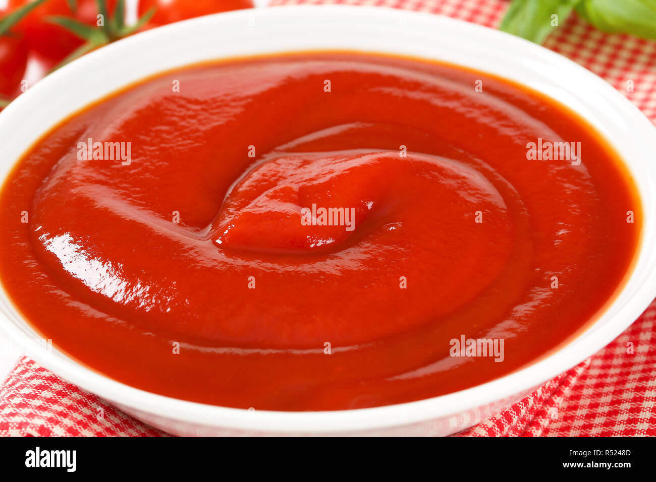 Smooth tomato puree Stock Photo - Alamy