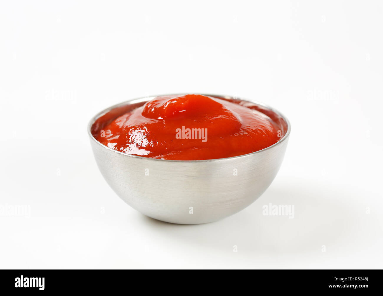 Smooth tomato puree Stock Photo - Alamy