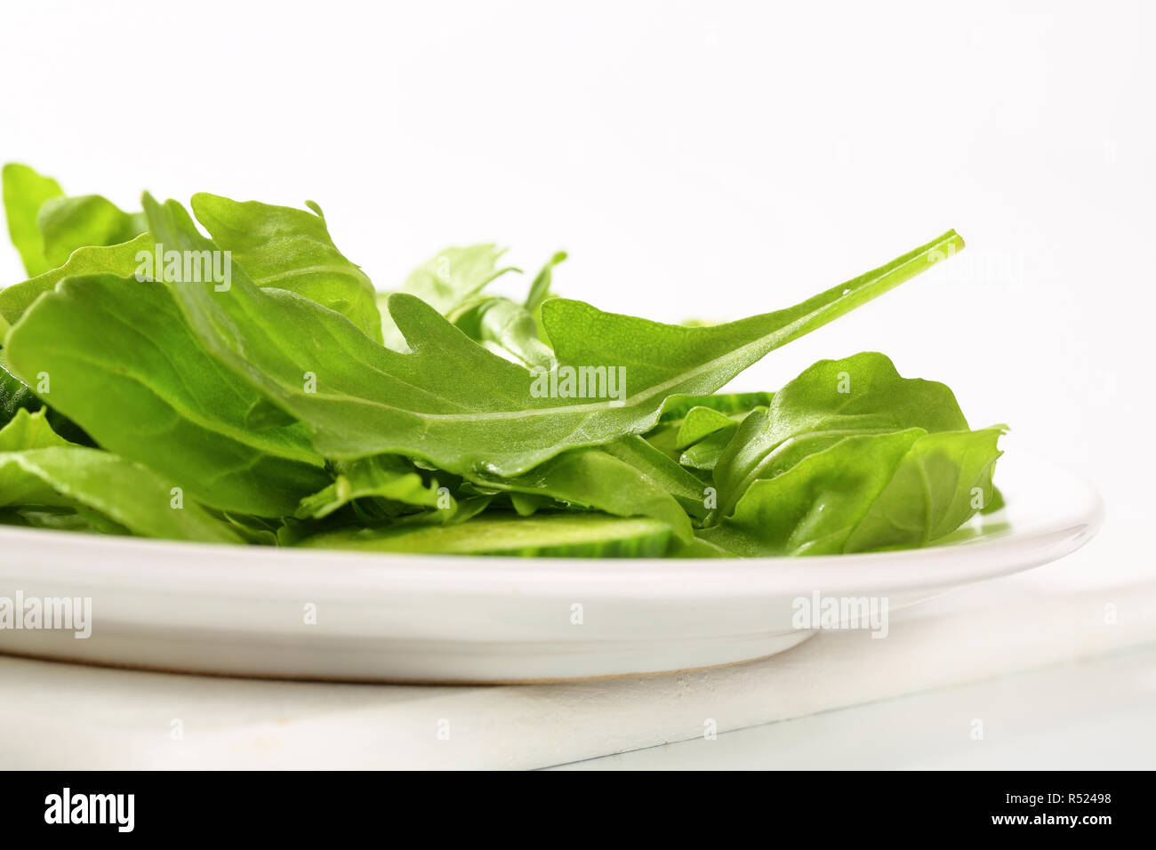 Rocket and cucumber salad Stock Photo - Alamy