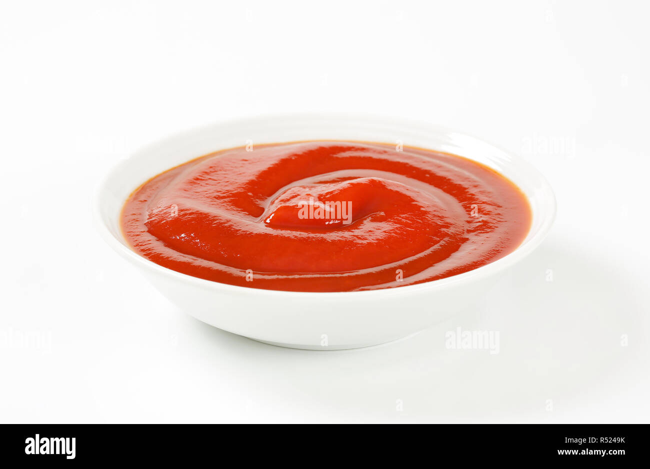 Smooth tomato puree Stock Photo - Alamy