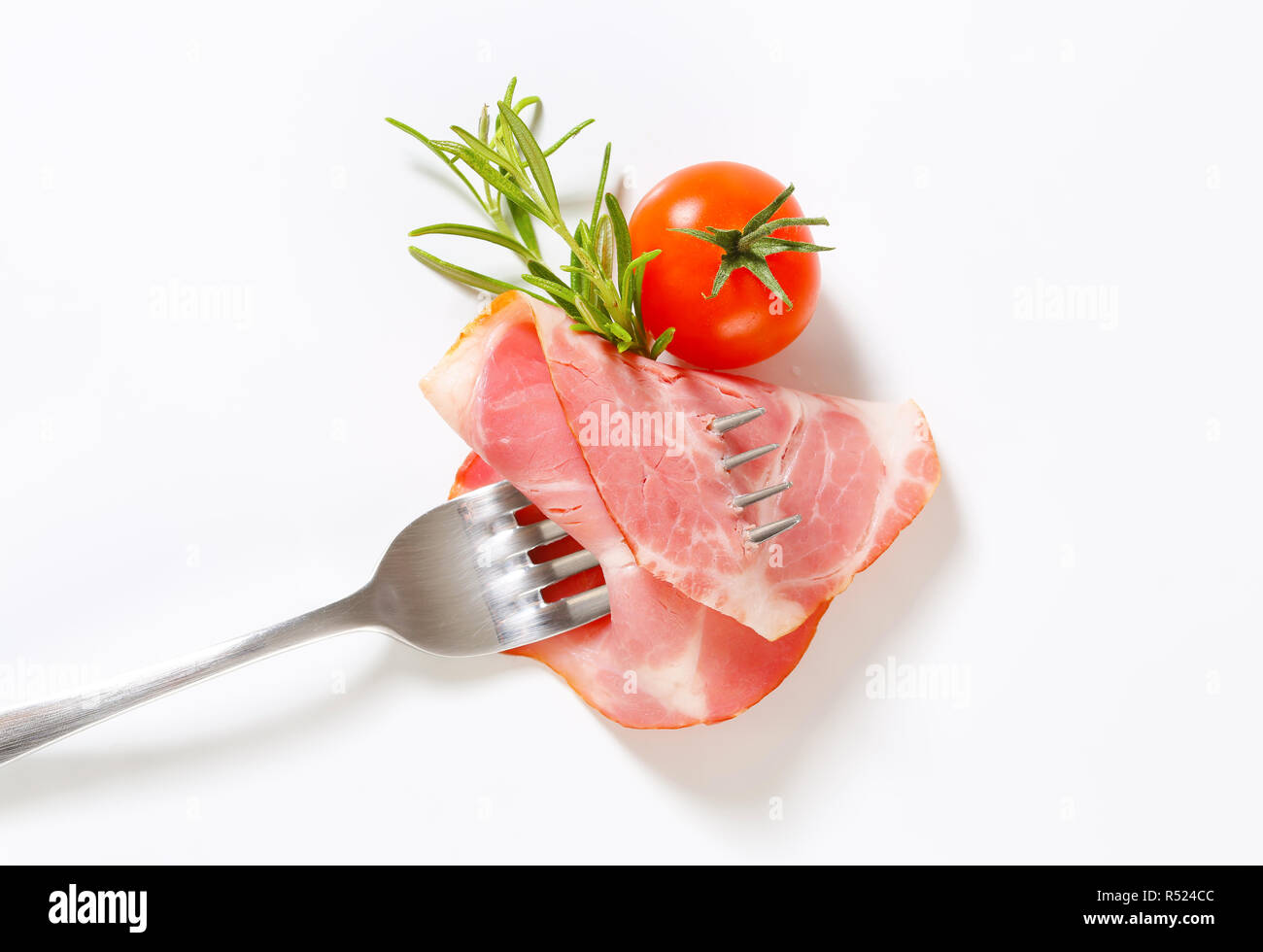 Smoked pork on fork Stock Photo - Alamy