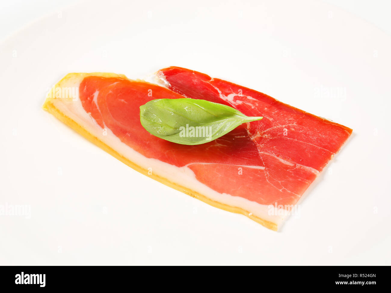 Slice of dry cured ham Stock Photo - Alamy