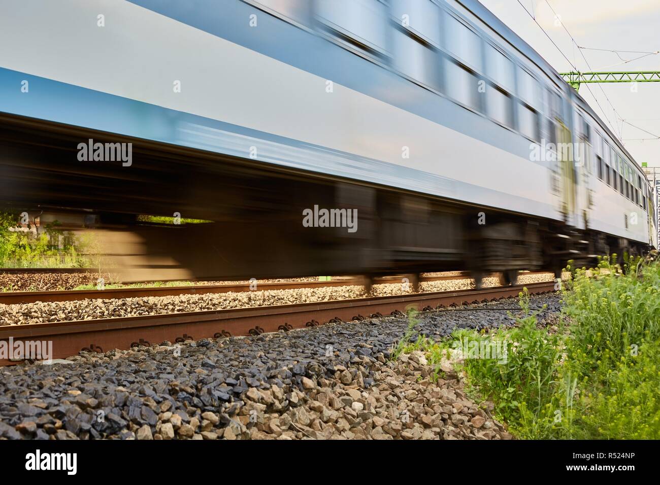 Train passing by Stock Photo - Alamy