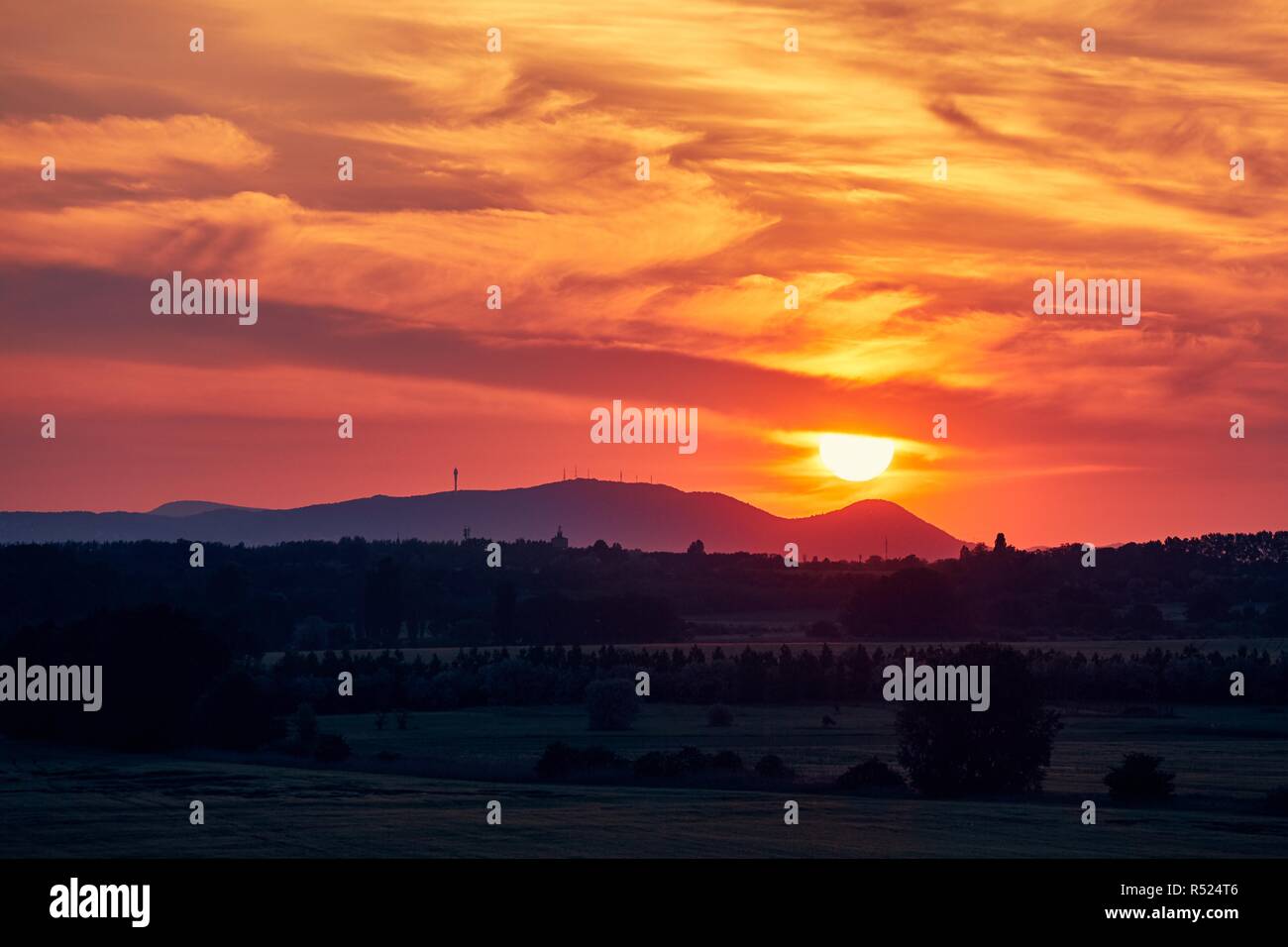 Sunset Hilly Landscape Stock Photo - Alamy