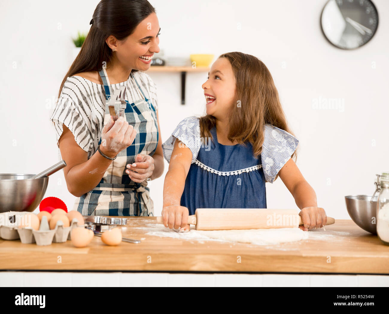 Learning to bake Stock Photo - Alamy