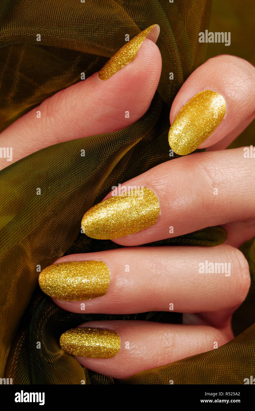 Yellow nails hi-res stock photography and images - Alamy