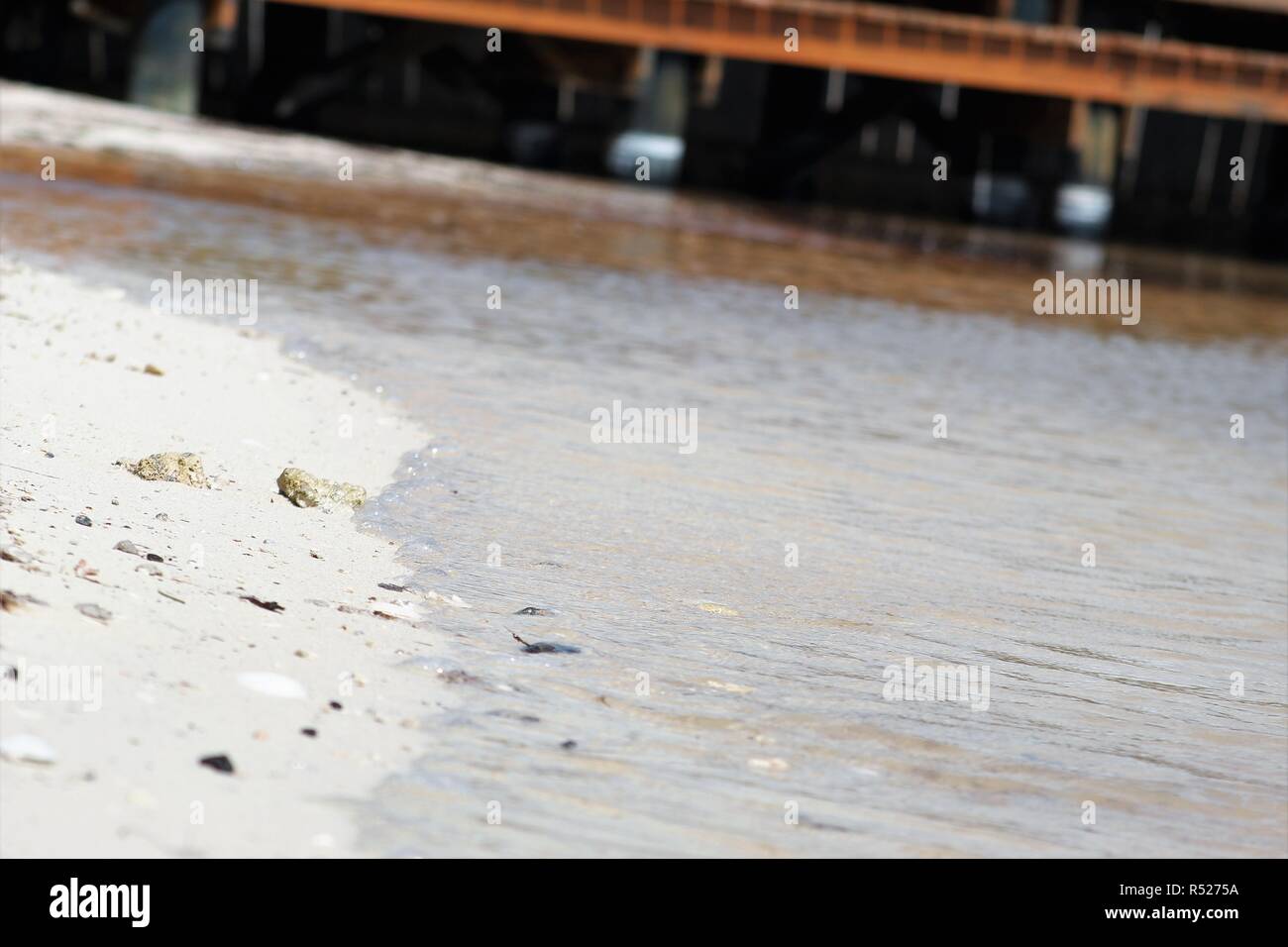 Waves lapping on rocky shore hi-res stock photography and images - Alamy