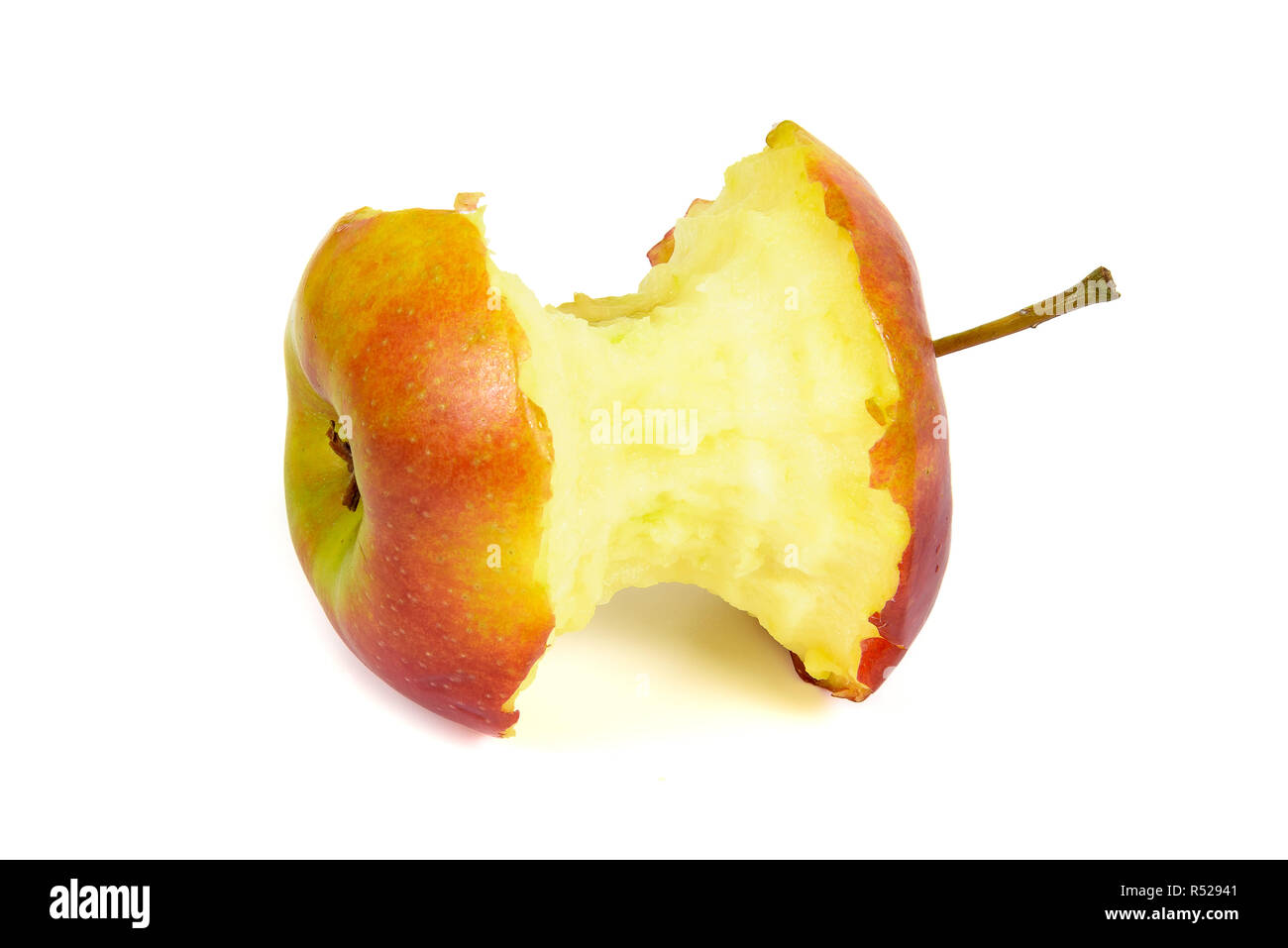 red apple core on white background Stock Photo - Alamy