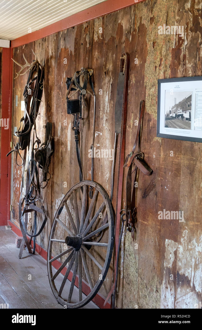 Rustic wooden interior of old Texan Home with antique wood wagon wheel ...