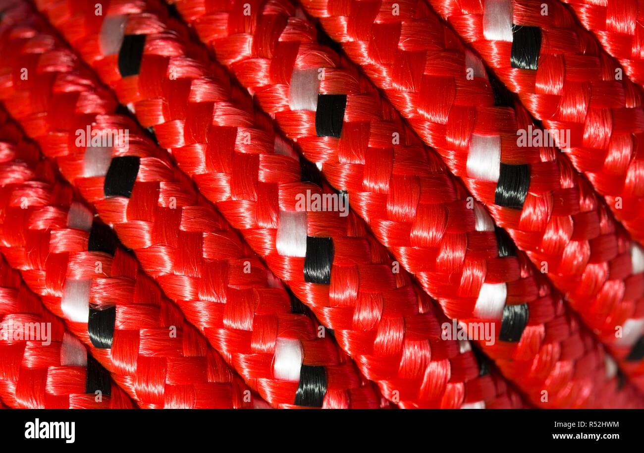 Extreme close up of new colourful red nylon rope Stock Photo - Alamy