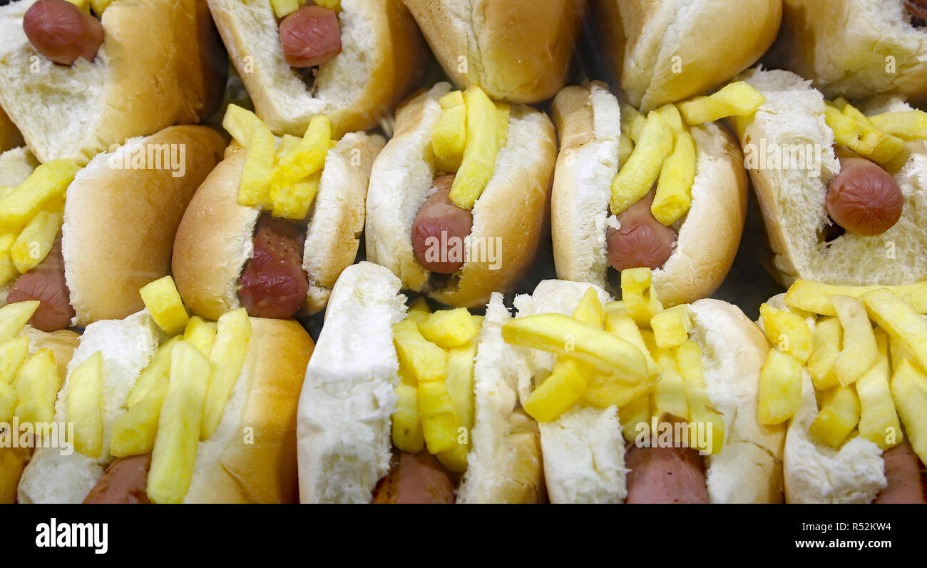 American hot dogs with wurstel and fries in a fast food restaurant ...