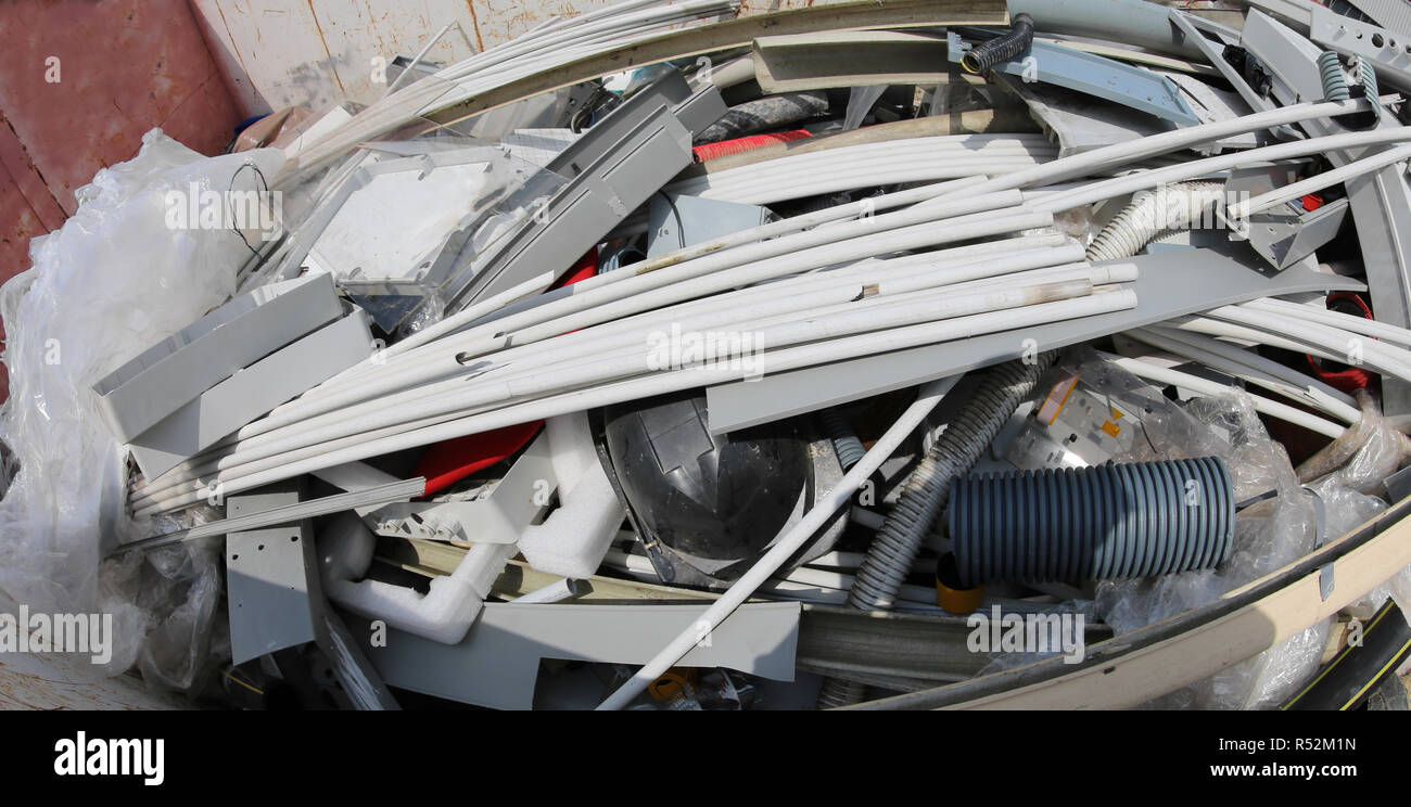 large container in a landfill with broken plastic pieces Stock Photo ...