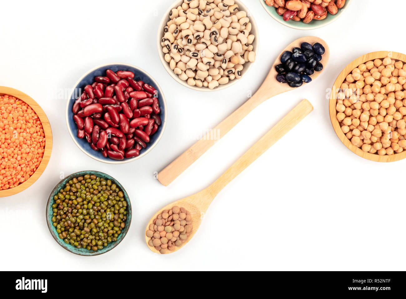 Various types of pulses, shot from above on a white background with ...