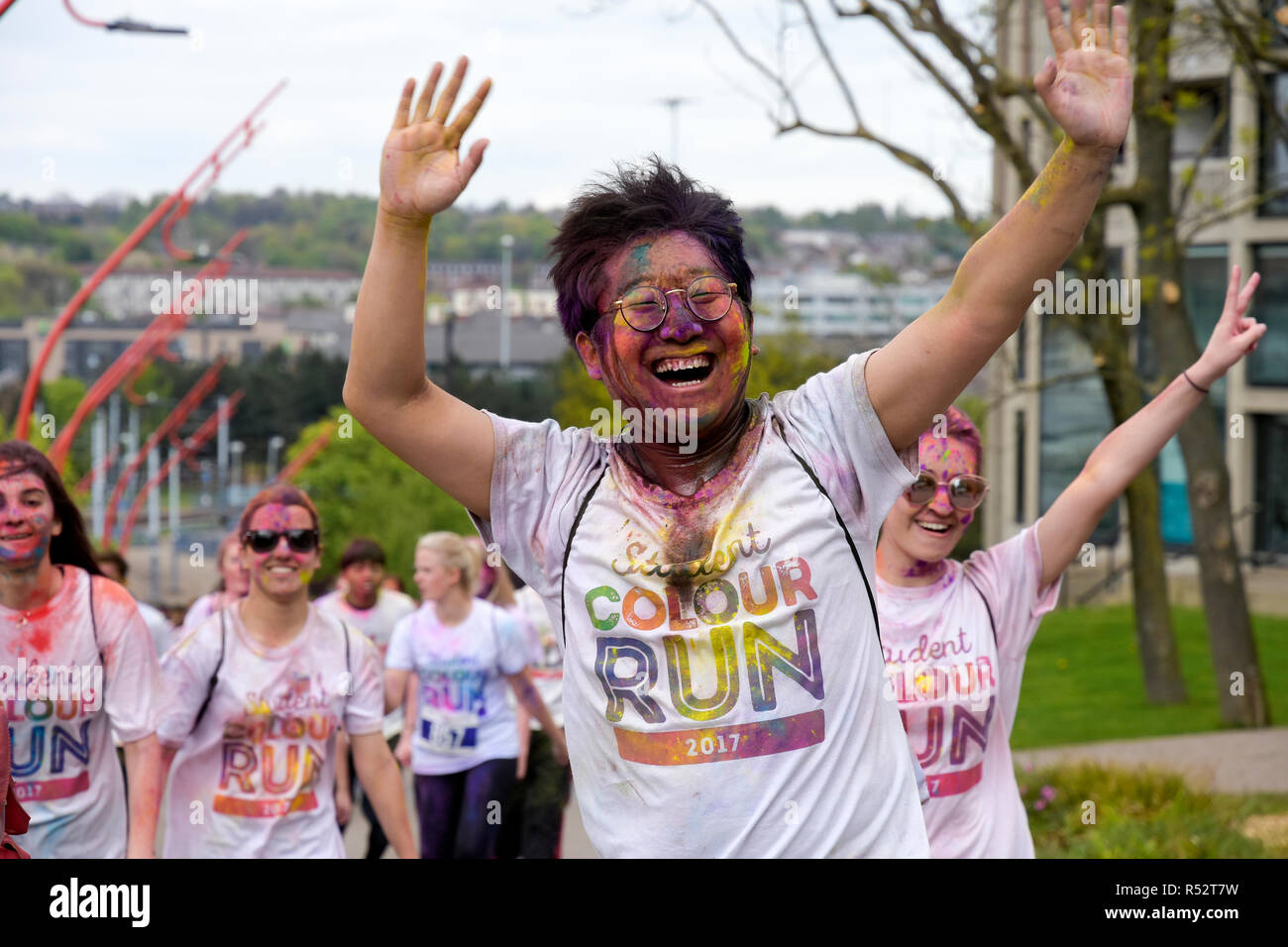 Happy students running hi-res stock photography and images - Alamy