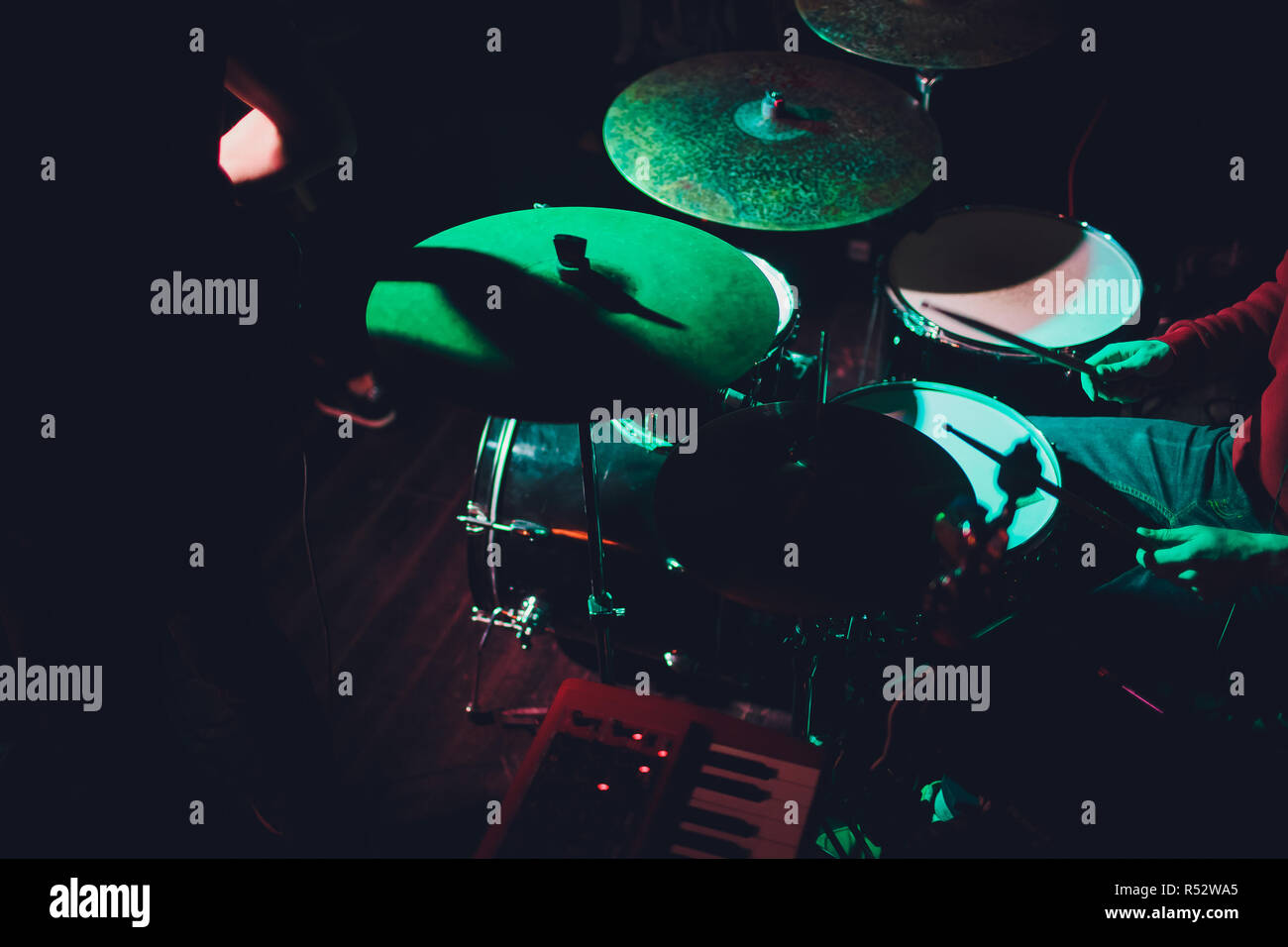 Modern drum set shot in smoky dark studio Stock Photo - Alamy