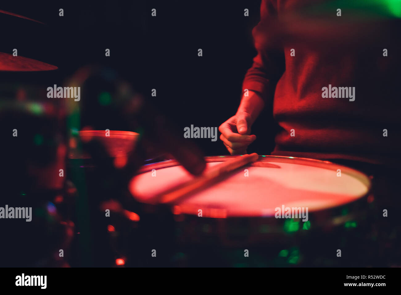 Human hands playing the drum with drumstick Stock Photo - Alamy