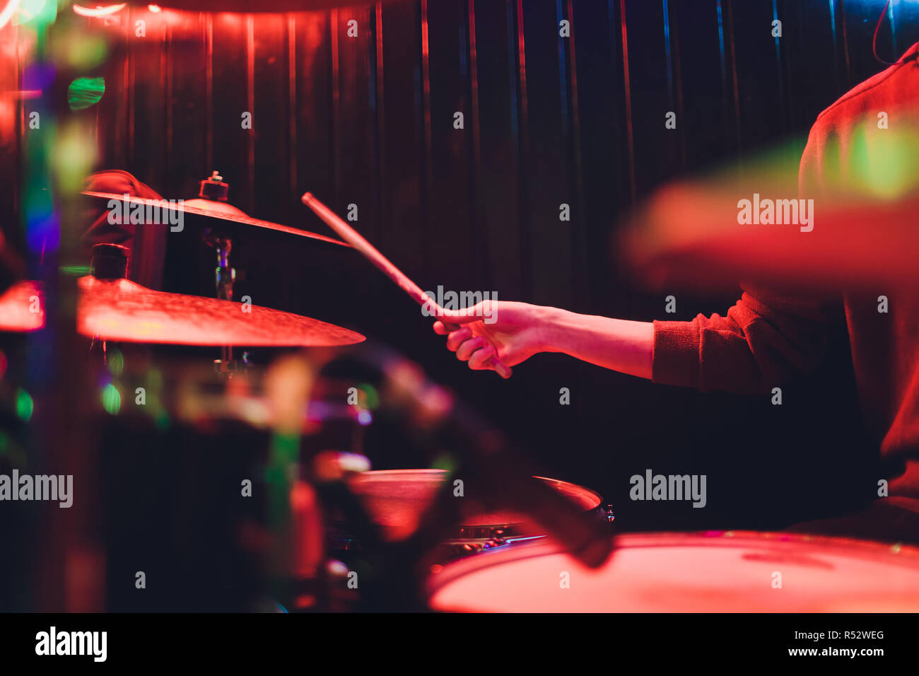 Human hands playing the drum with drumstick Stock Photo - Alamy