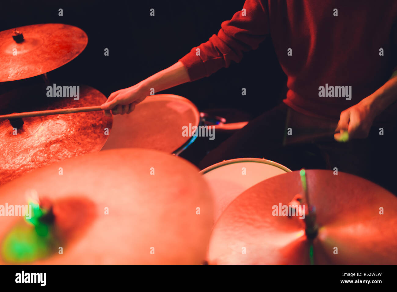 Human hands playing the drum with drumstick Stock Photo - Alamy