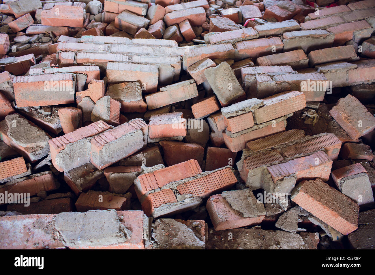 The hole from rocket in brick wall Stock Photo - Alamy