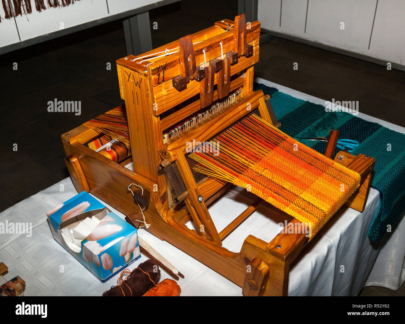 Weaving, the ancient art of producing goods and art from natural fibers ...