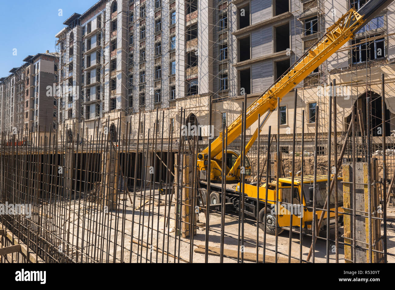 lifting machine on the construction site Stock Photo - Alamy