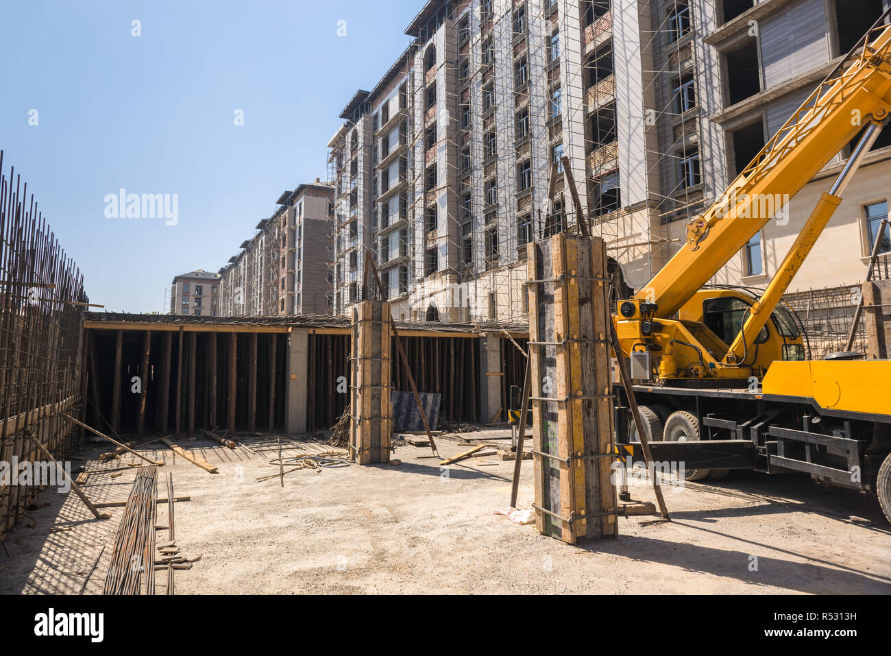 lifting machine on the construction site Stock Photo - Alamy