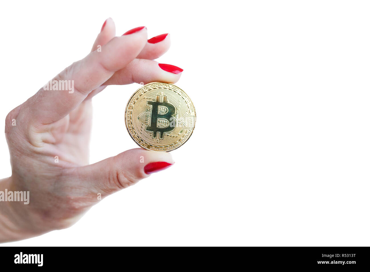 virtual money golden bitcoin women hand with red nails fingers isolated ...