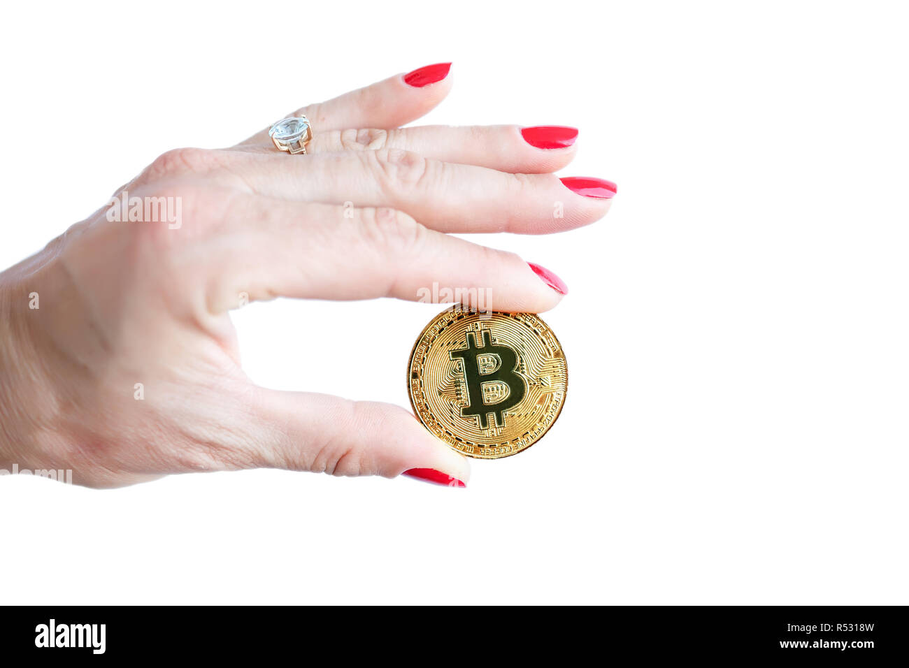 virtual money golden bitcoin women hand with red nails fingers isolated ...