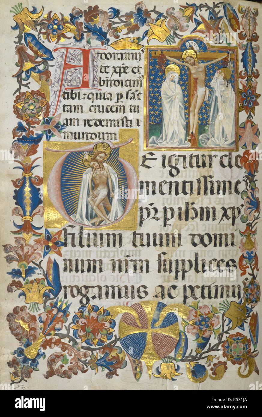 Miniature with the Crucifixion, and historiated initial with God ...