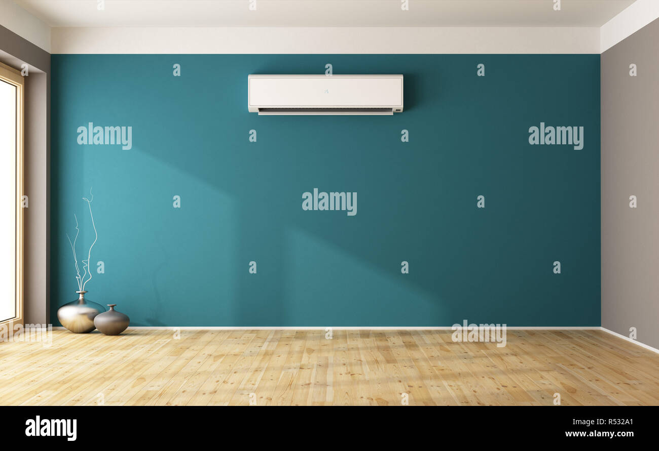 Empty blue living room Stock Photo - Alamy