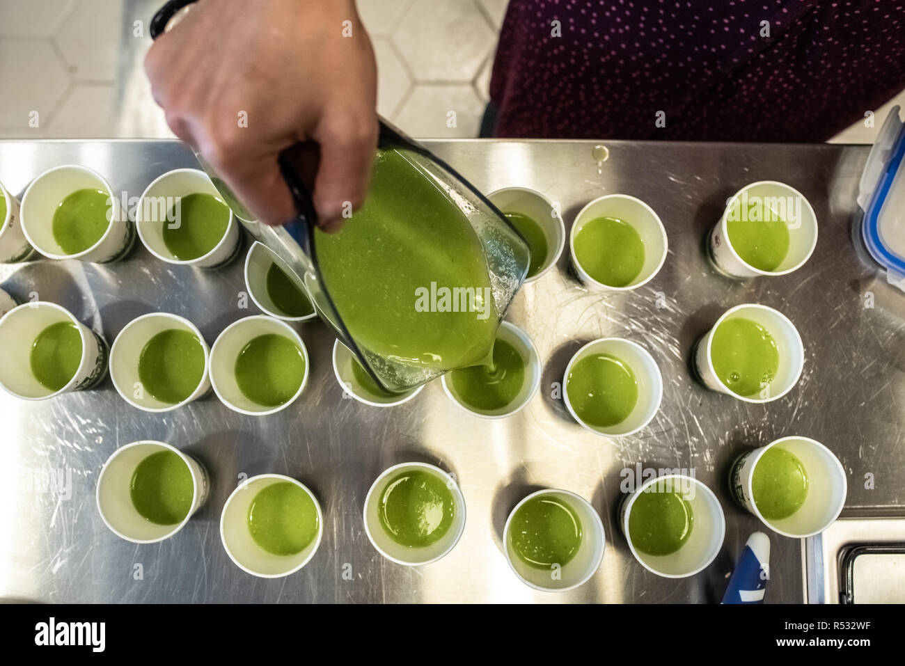 Cook plating their dishes and serving them hot and tasty Stock Photo ...
