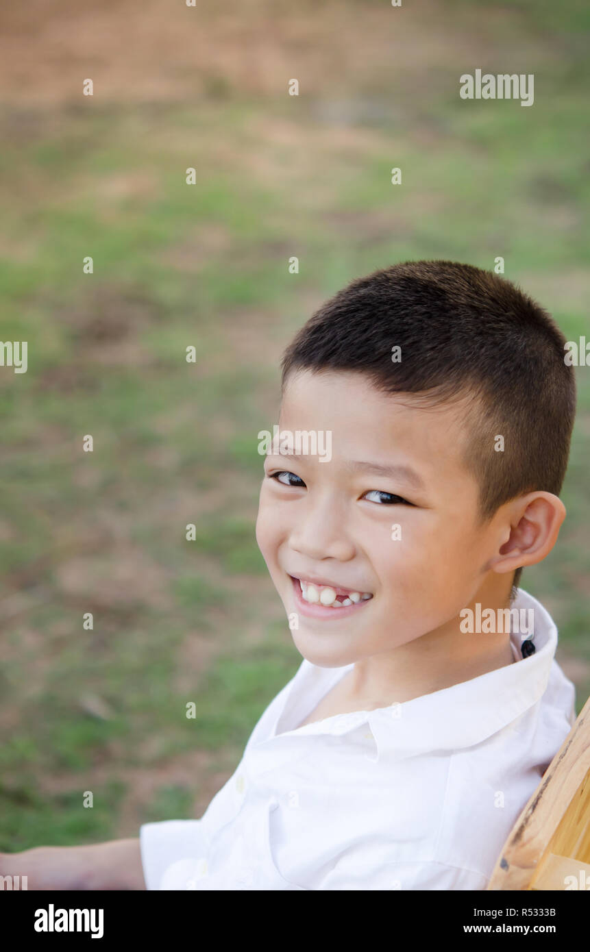 Asian boy smiling hi-res stock photography and images - Alamy